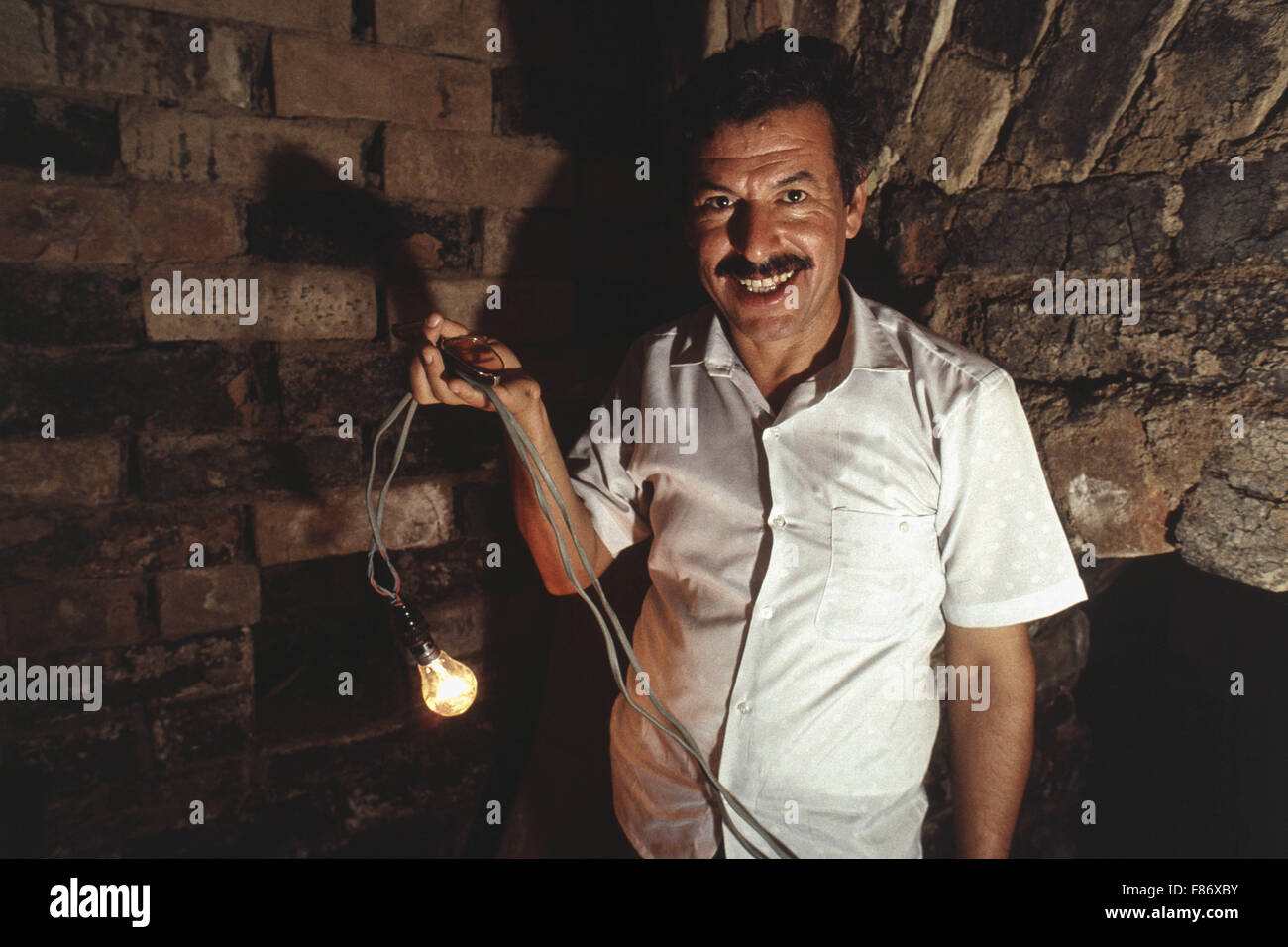 Iraqi archaeologist Mahmoud standing in the chamber where he made Iraq ...
