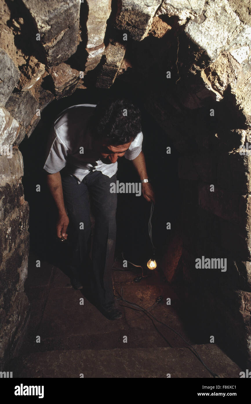 Iraqi archaeologist Mahmoud standing in the chamber where he made Iraq ...