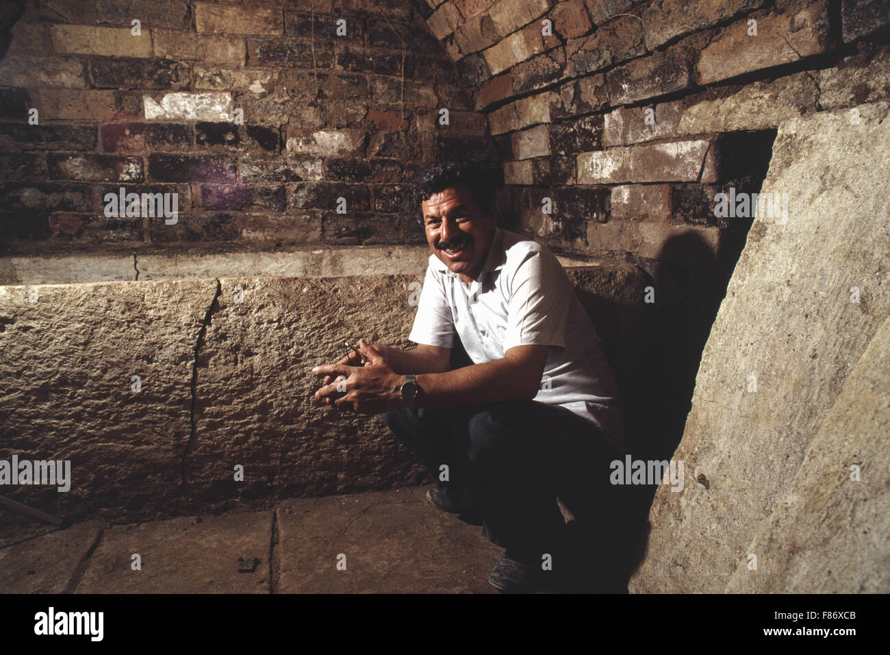 Iraqi archaeologist Mahmoud standing in the chamber where he made Iraq ...