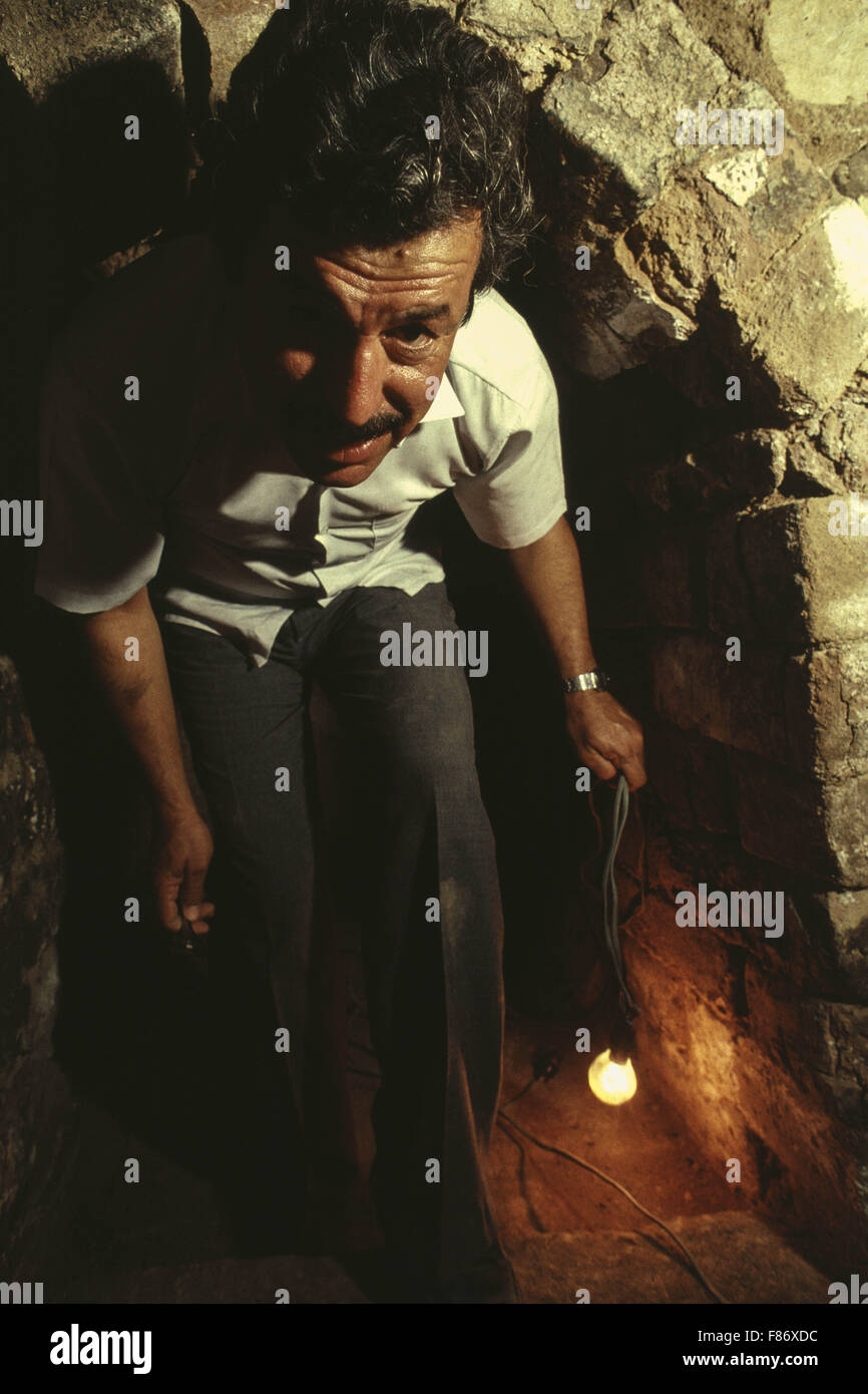 Iraqi archaeologist Mahmoud standing in the chamber where he made Iraq ...
