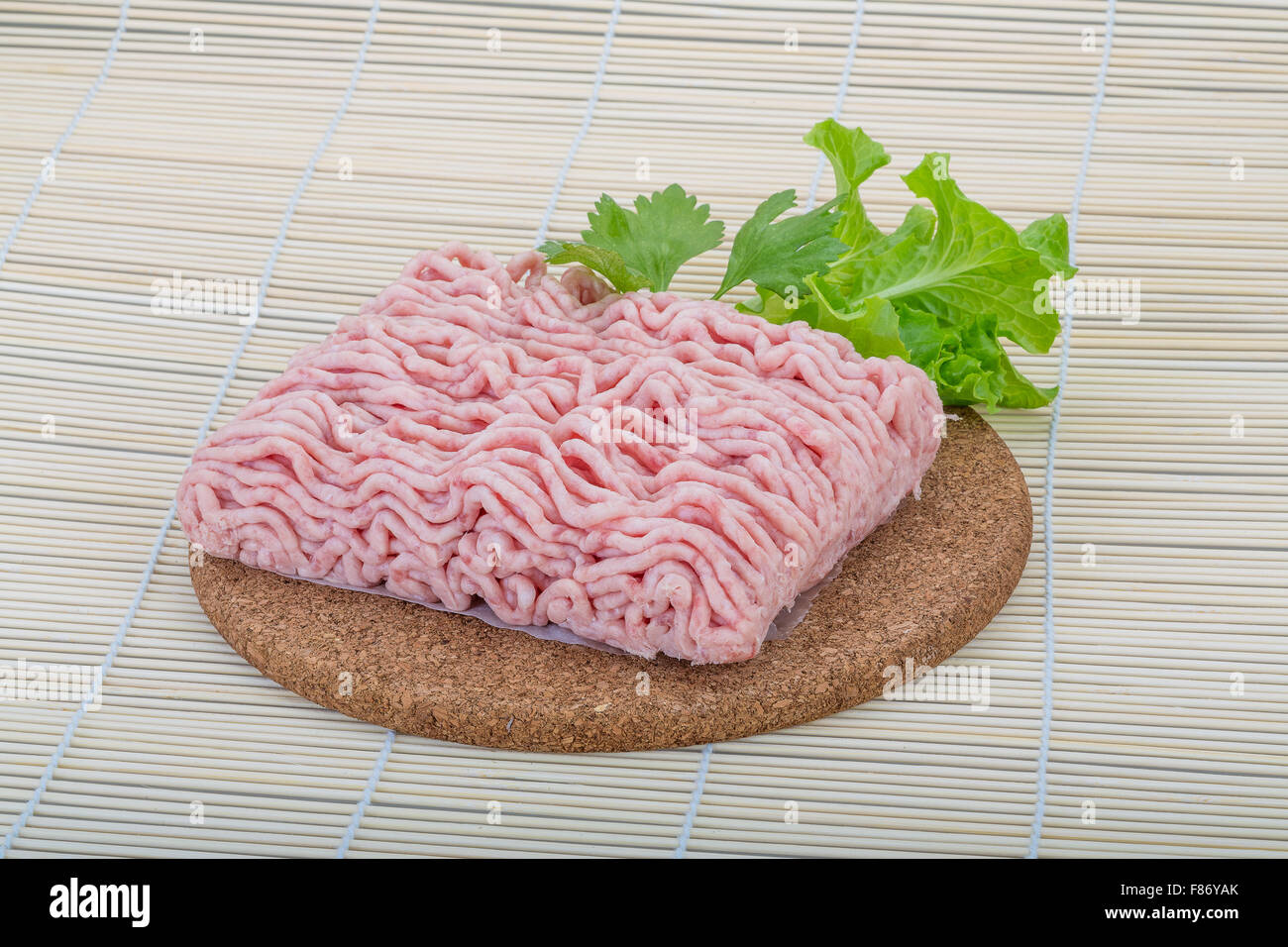 Raw minced pork meat on the desk with herbs Stock Photo - Alamy