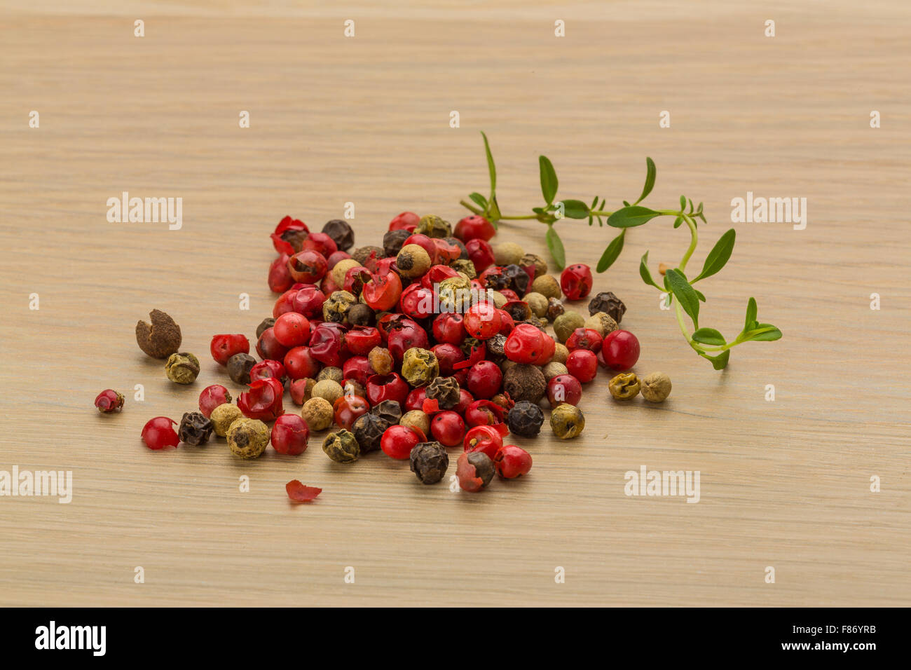 Red pepper corn heap on the desk Stock Photo - Alamy
