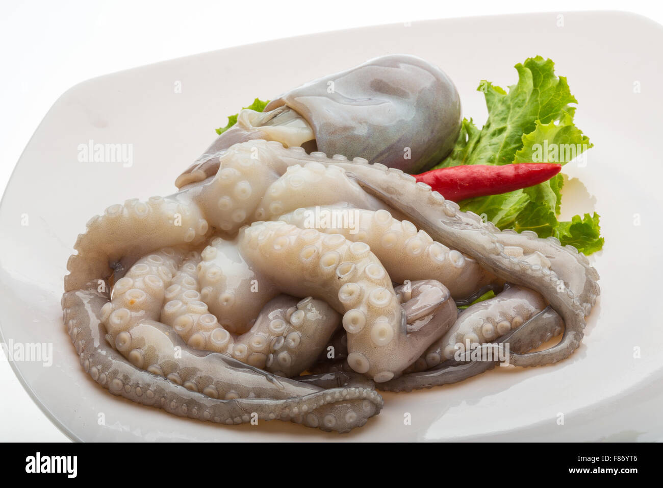 Raw octopus ready for cooking Stock Photo - Alamy