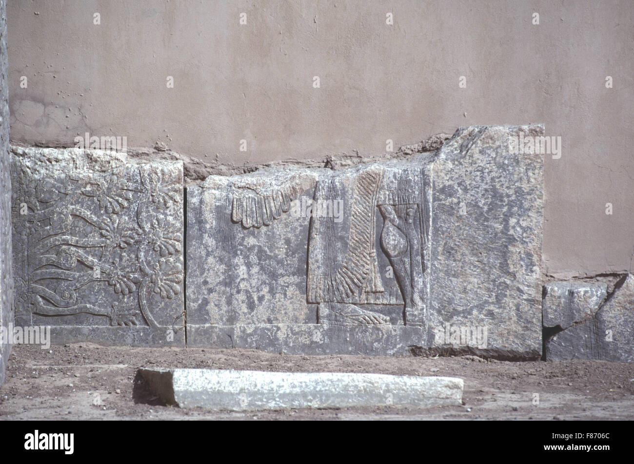 Carved stone reliefs, stele and cuneiform inscriptions at the Royal ...