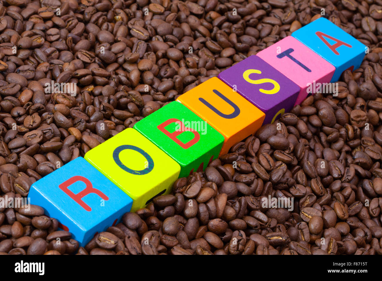 Colored children's cubes and coffee beans - Robusta is a sturdy species ...