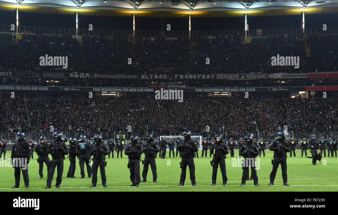 Police officer secure the pitch as soccer fans riot in the soccer ...