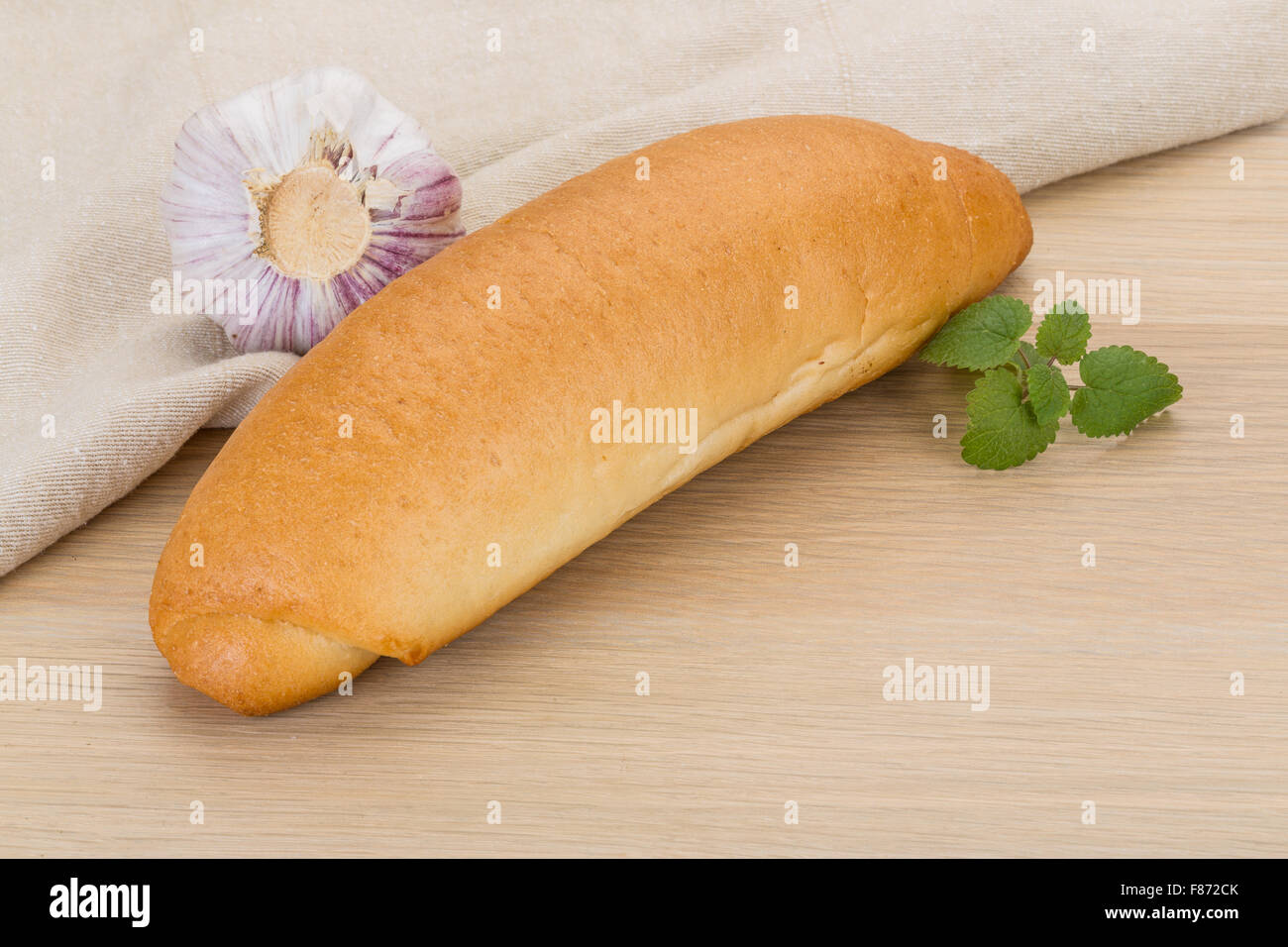 Fresh baked bread - on the desk Stock Photo - Alamy