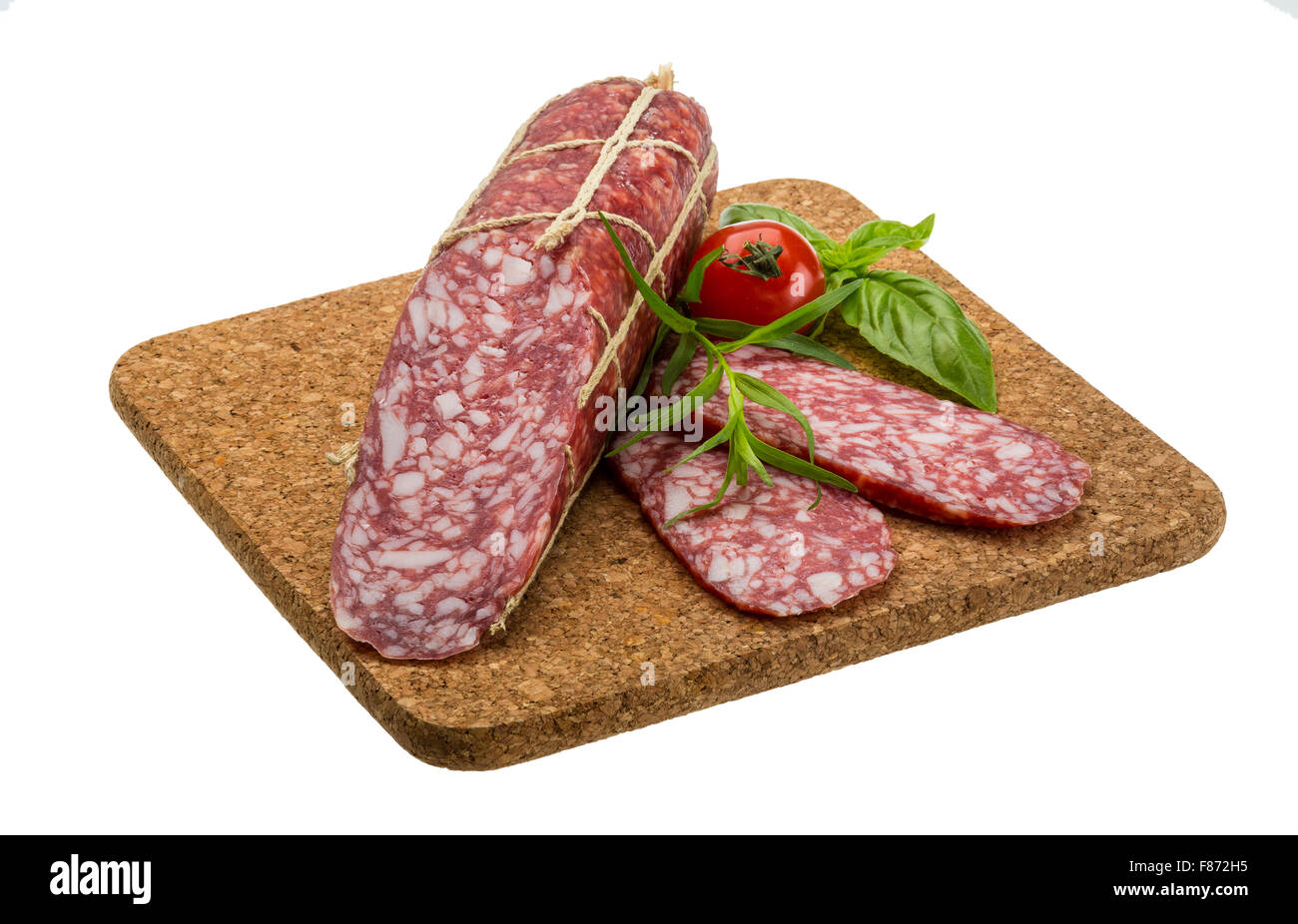 Salami sausages sliced with basil Stock Photo - Alamy