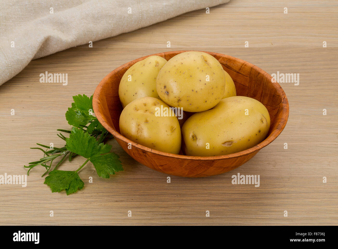 New season Raw potatoes on the desk Stock Photo - Alamy