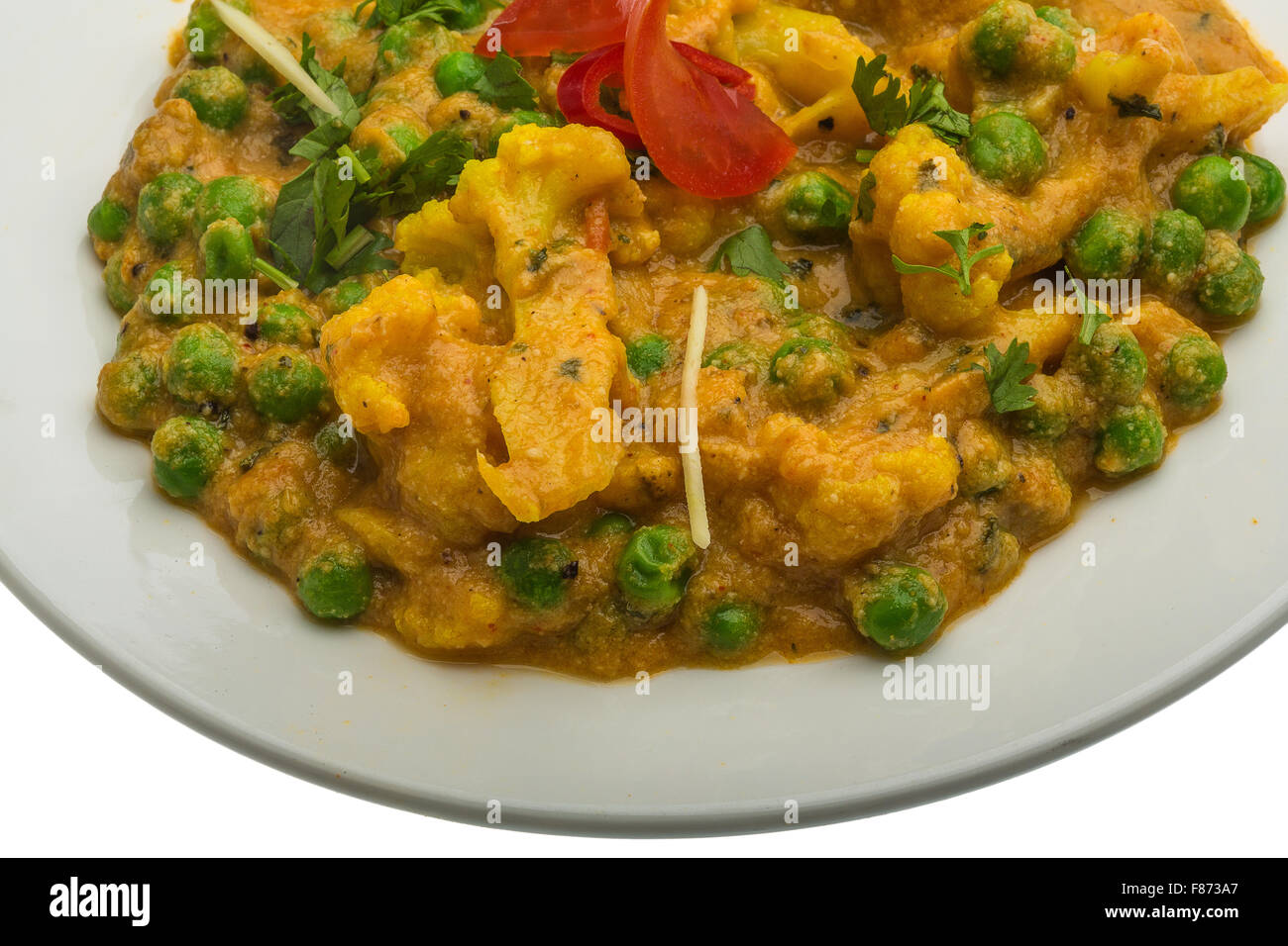 Gobi Mutter Kaju - cauliflower with green peas and cashew Stock Photo ...