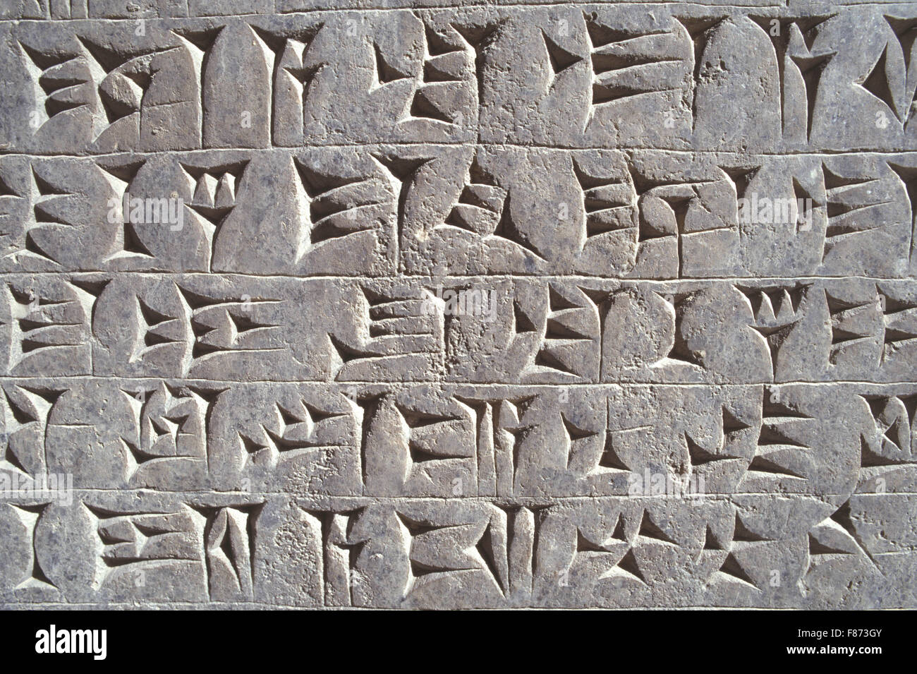 Carved stone reliefs, stele and cuneiform inscriptions at the Royal ...