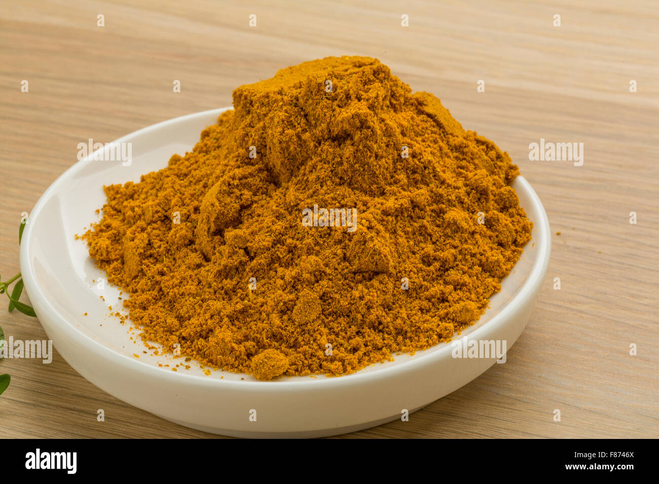 Curry powder in the bowl Stock Photo - Alamy