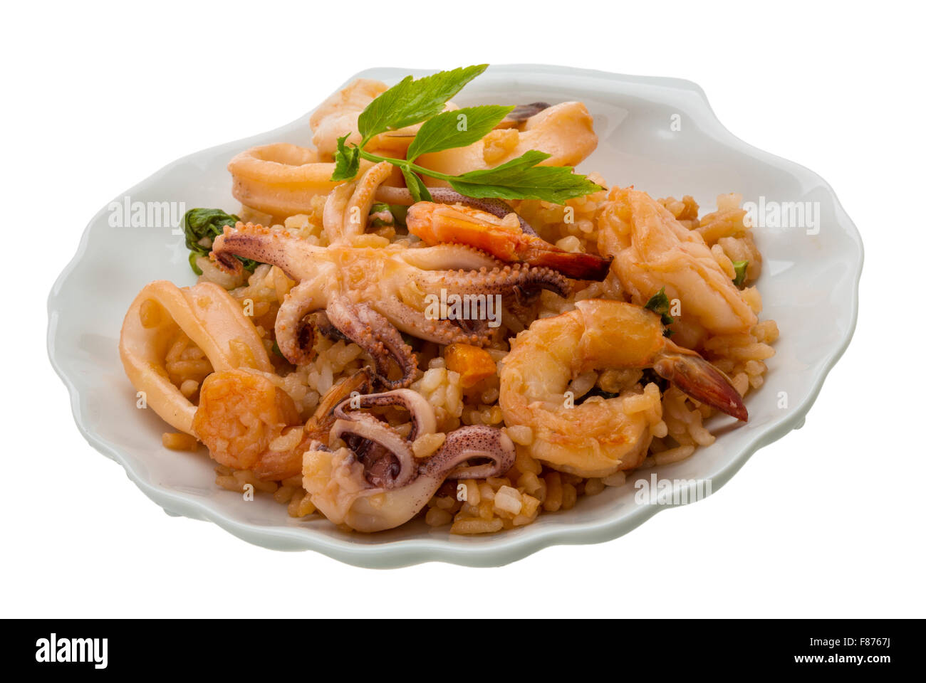Rice with seafood isolated on white Stock Photo - Alamy