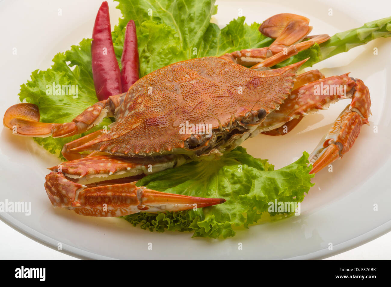 Boiled crab with pepper and salad Stock Photo - Alamy