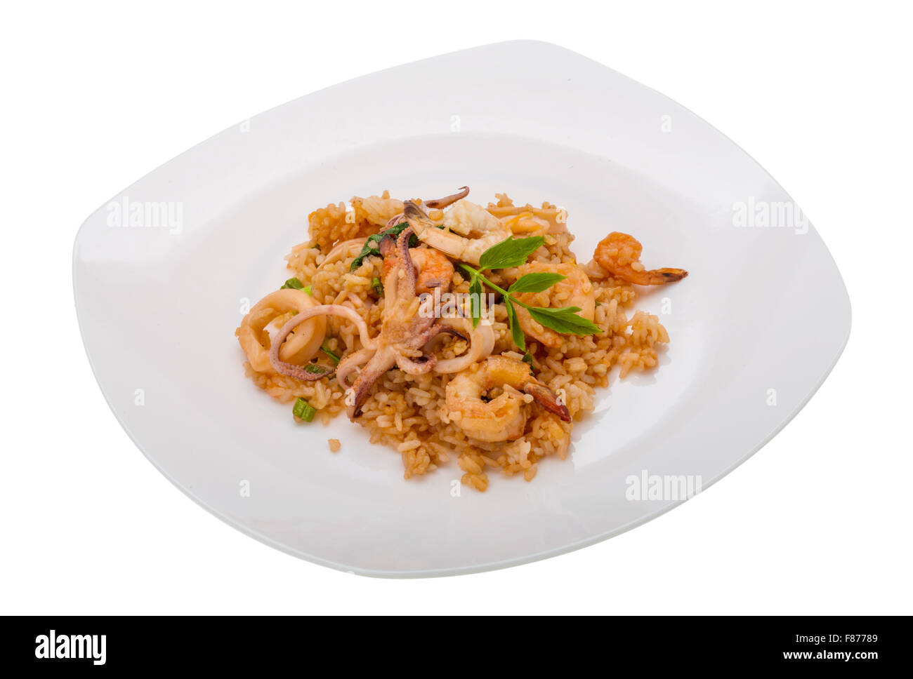 Rice with seafood isolated on white Stock Photo - Alamy