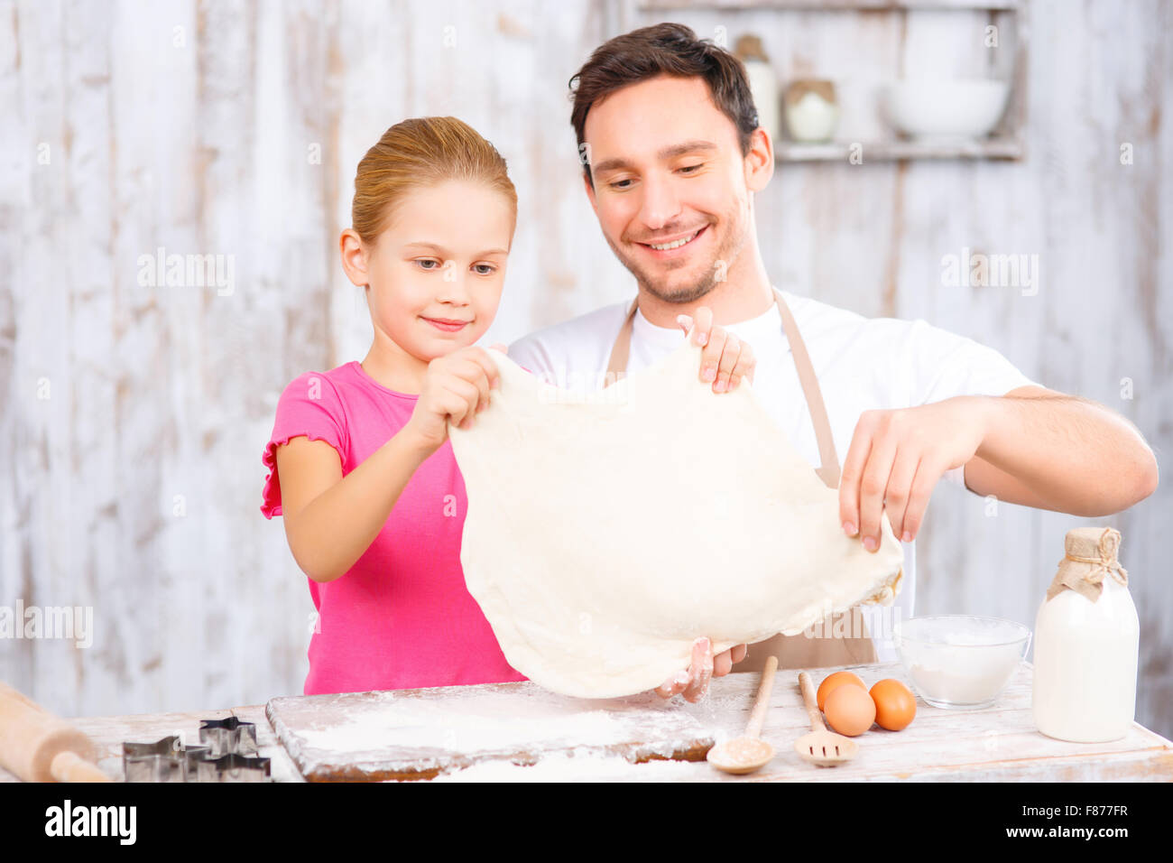Happy father and daughter baking together Stock Photo - Alamy