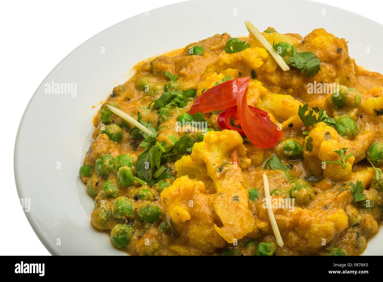 Gobi Mutter Kaju - cauliflower with green peas and cashew Stock Photo ...