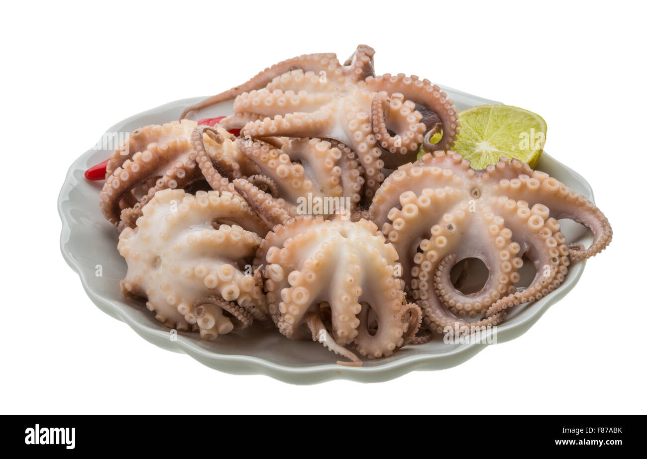 Boiled octopus with pepper and lime Stock Photo - Alamy