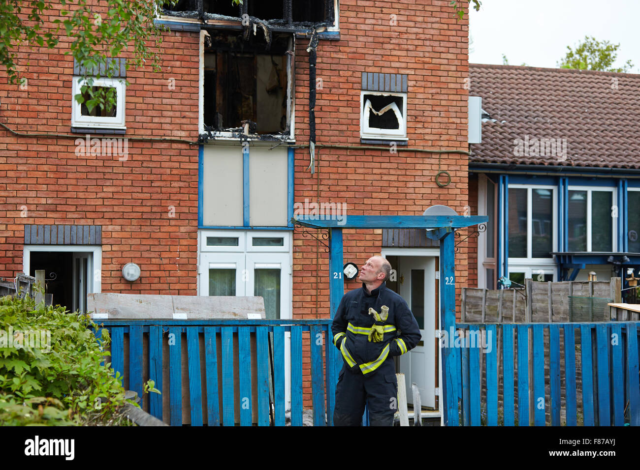 A fire fighter at the scene of a fatal house fire in St Leger Court ...