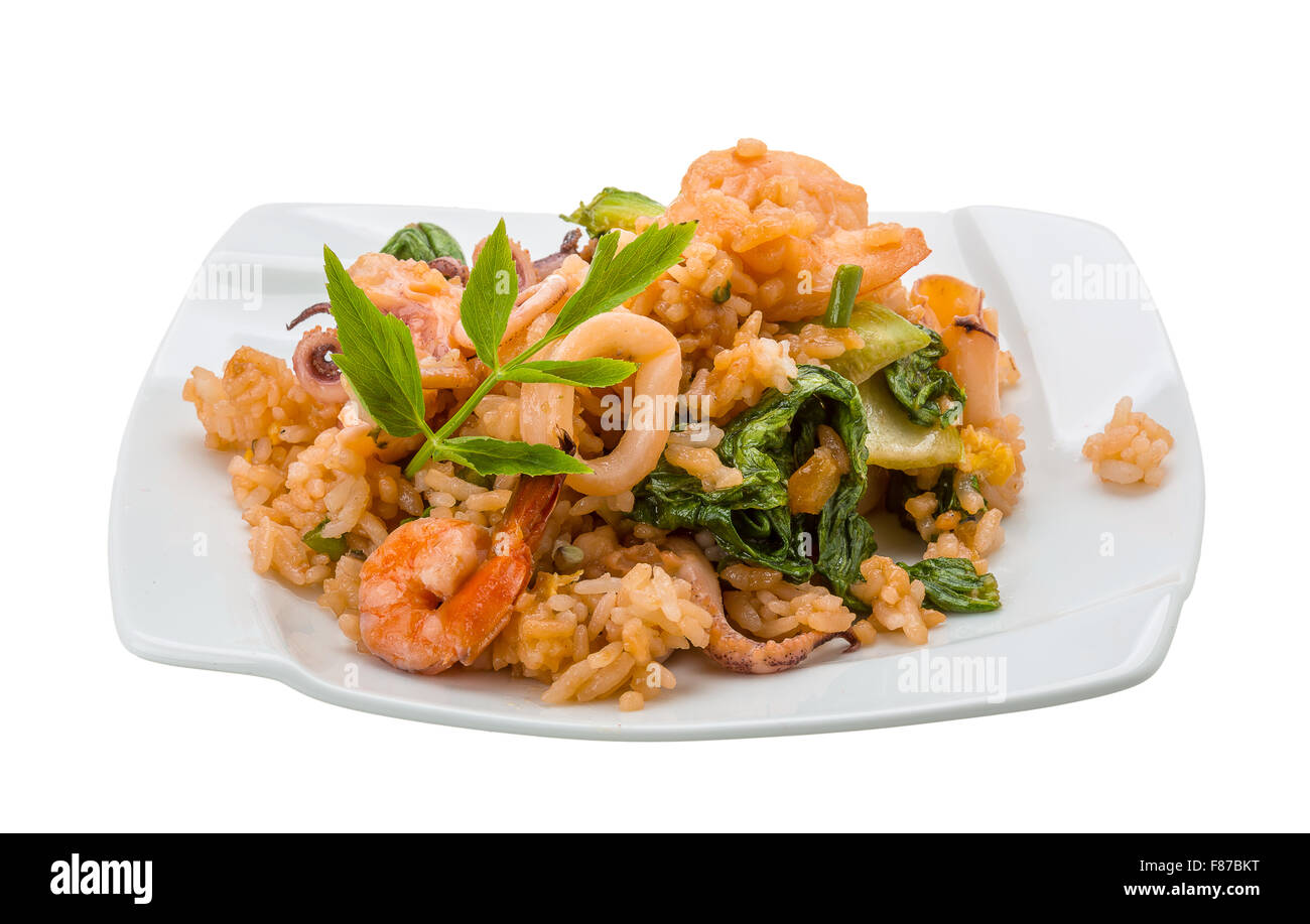 Rice with seafood isolated on white Stock Photo - Alamy
