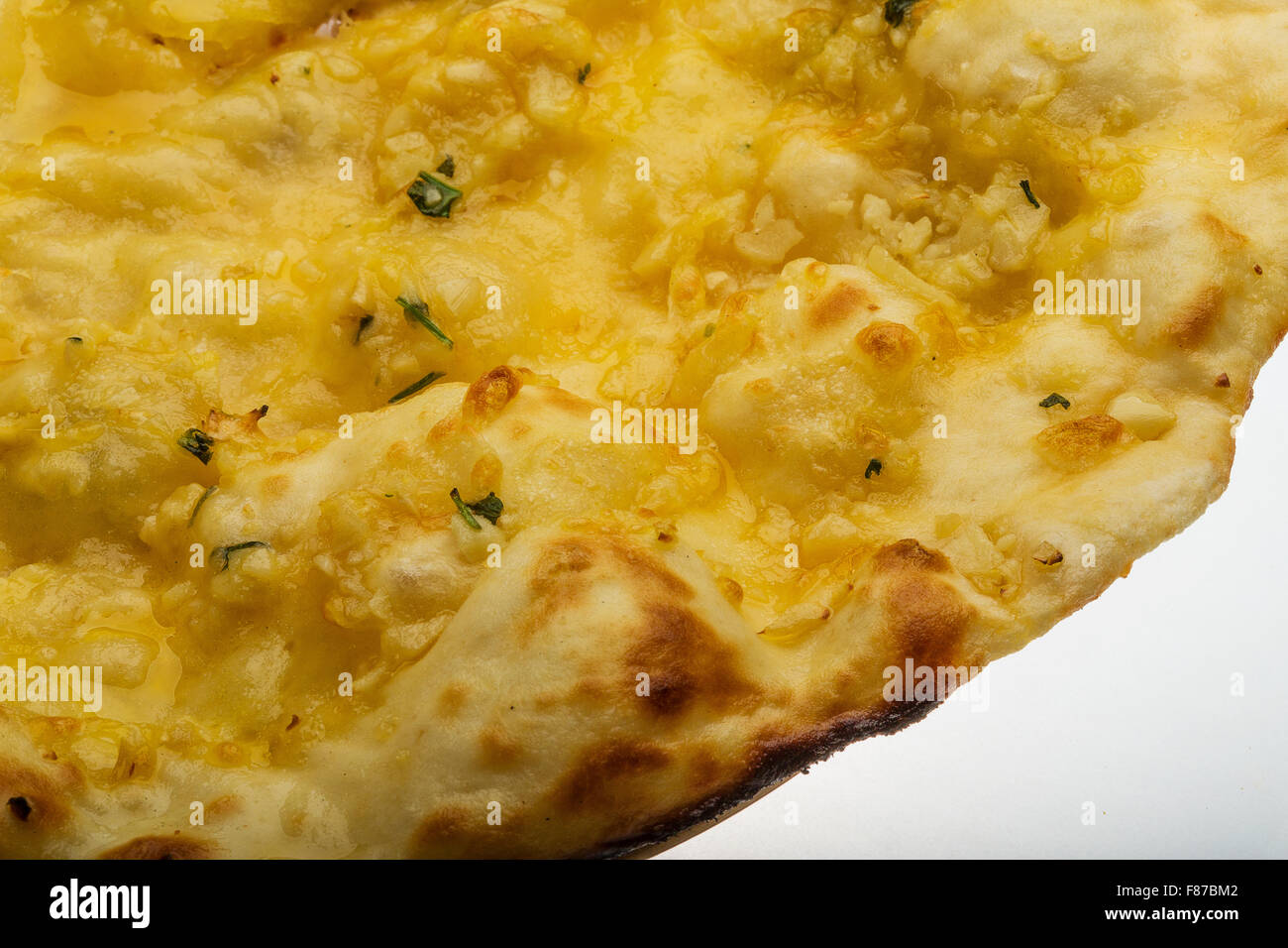 Naan with cheese and garlic - Indian bread Stock Photo - Alamy