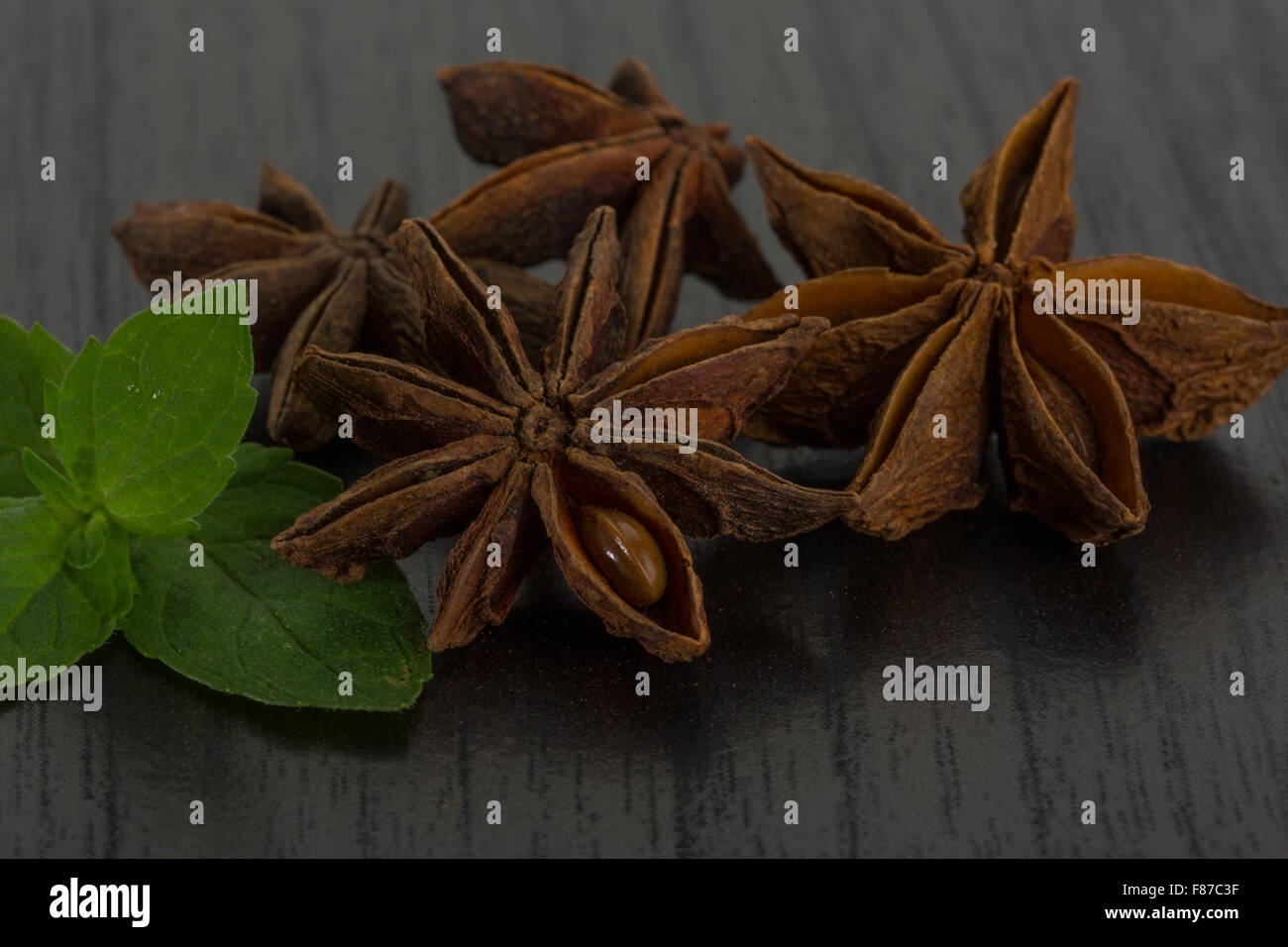 Star anise with mint leaves Stock Photo - Alamy