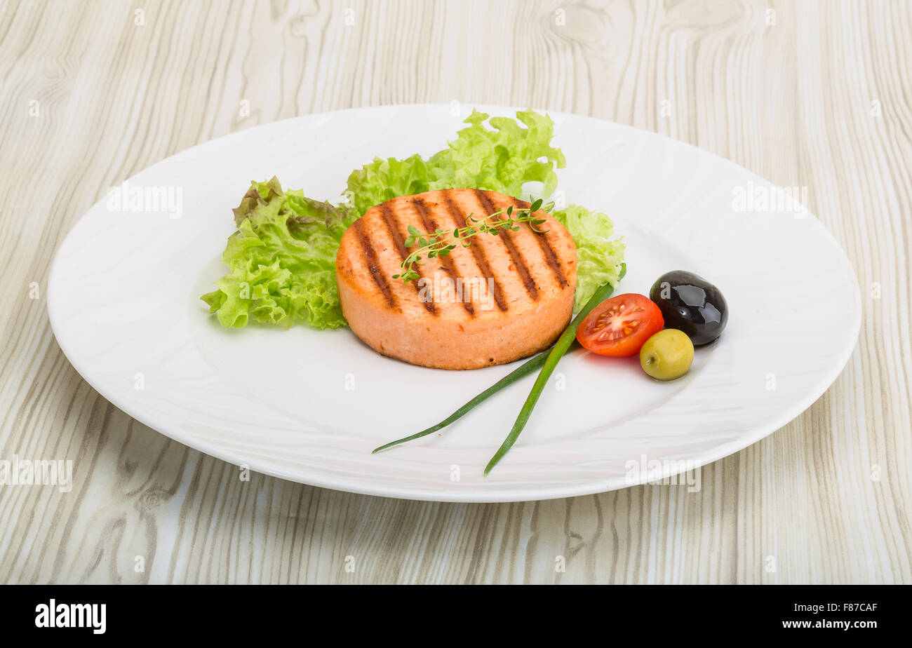 Grilled Fish cakes in the bowl with salad leaves Stock Photo - Alamy