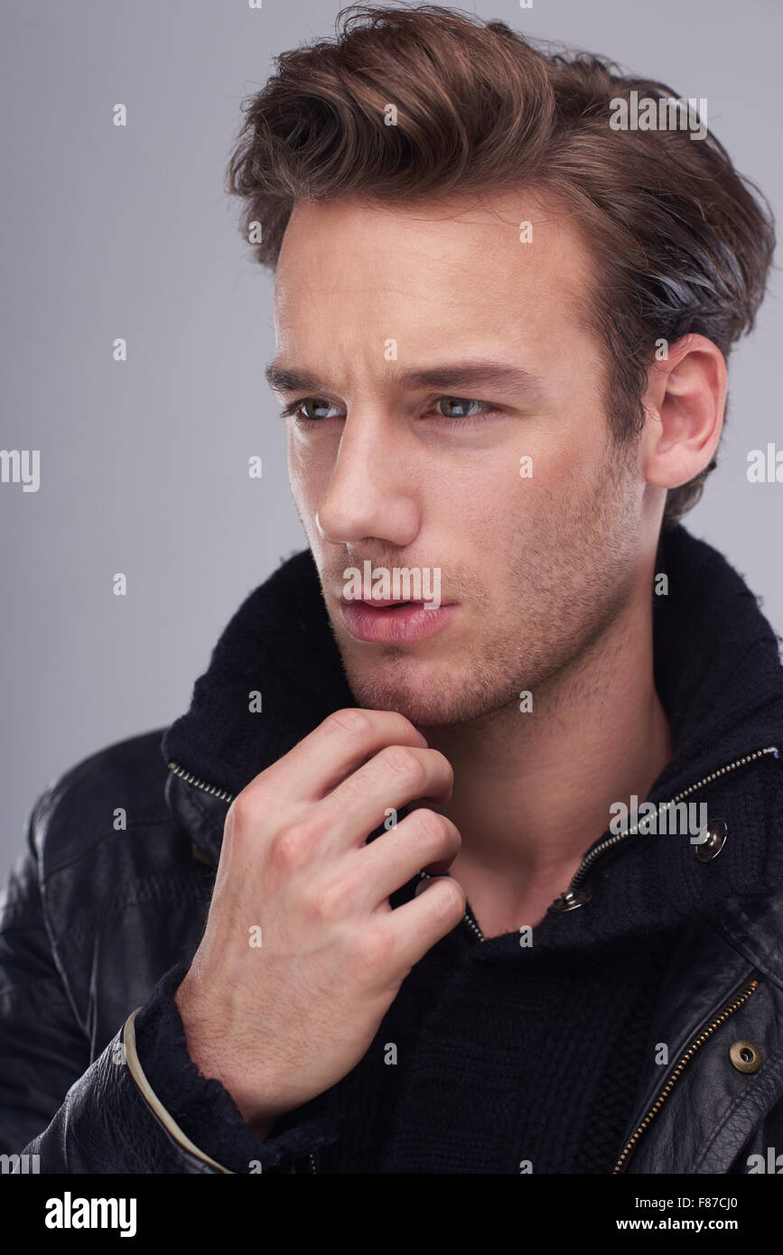 handsome young man portrait isolated on white background in studio ...