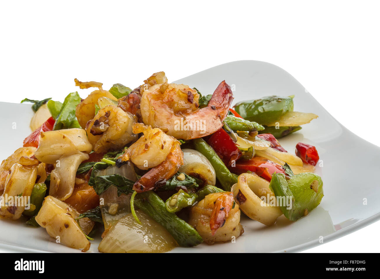 Seafood with vegetables - shrimps and calamari Stock Photo - Alamy