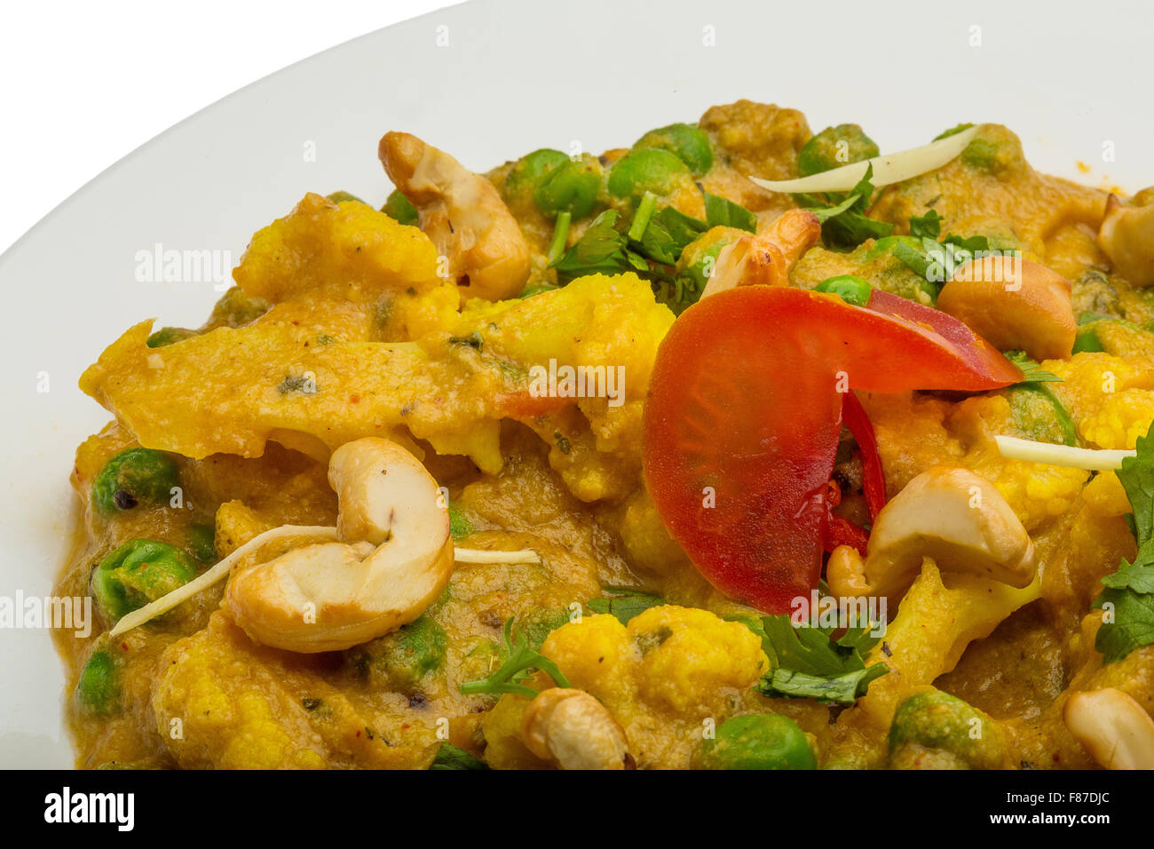 Gobi Mutter Kaju - cauliflower with green peas and cashew Stock Photo ...