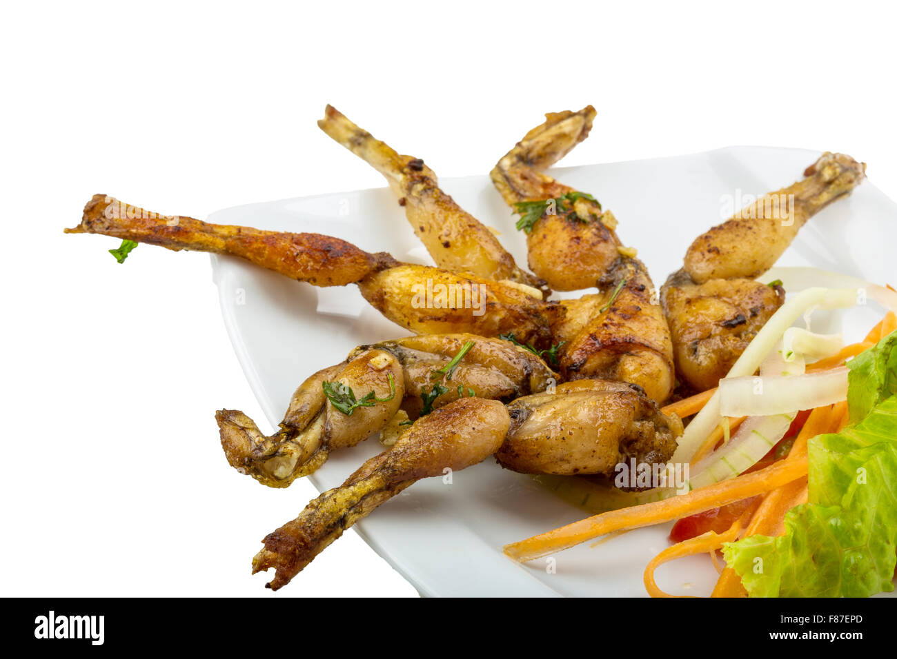 Grilled frog legs - French style Stock Photo - Alamy