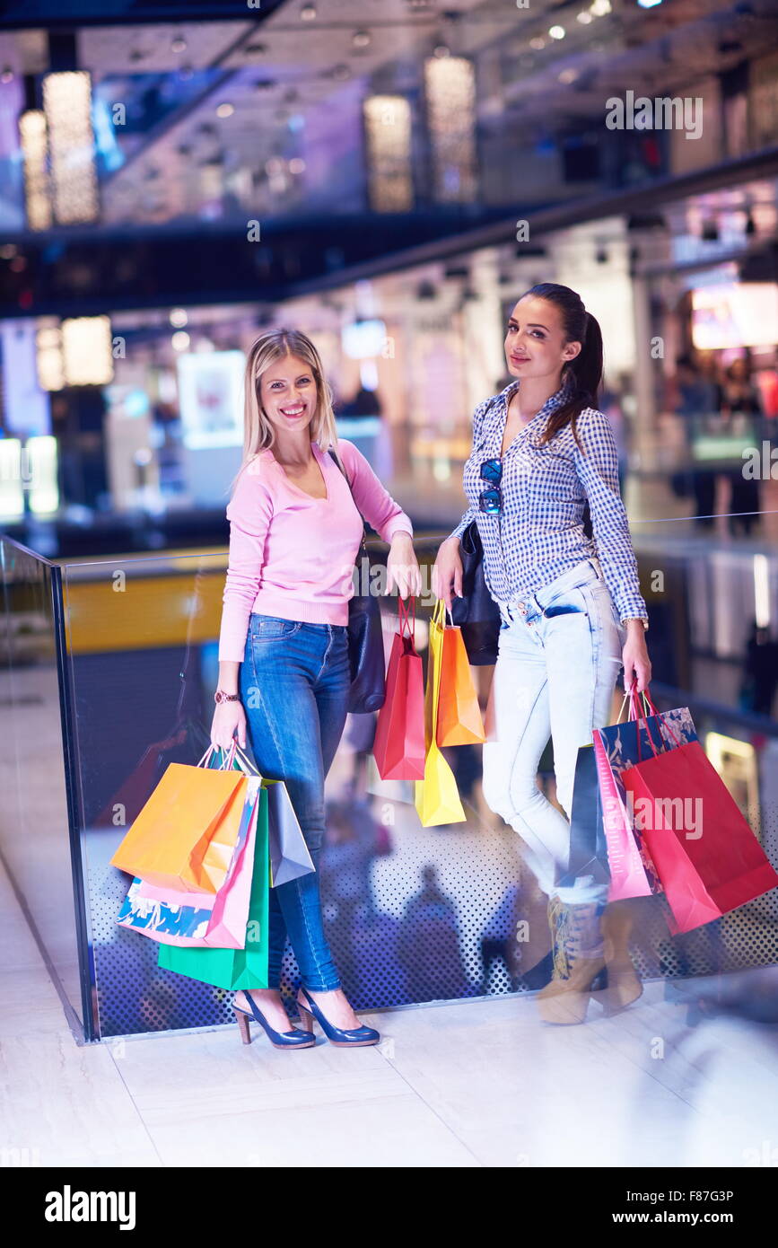 happy young girls in shopping mall, friends having fun together Stock ...