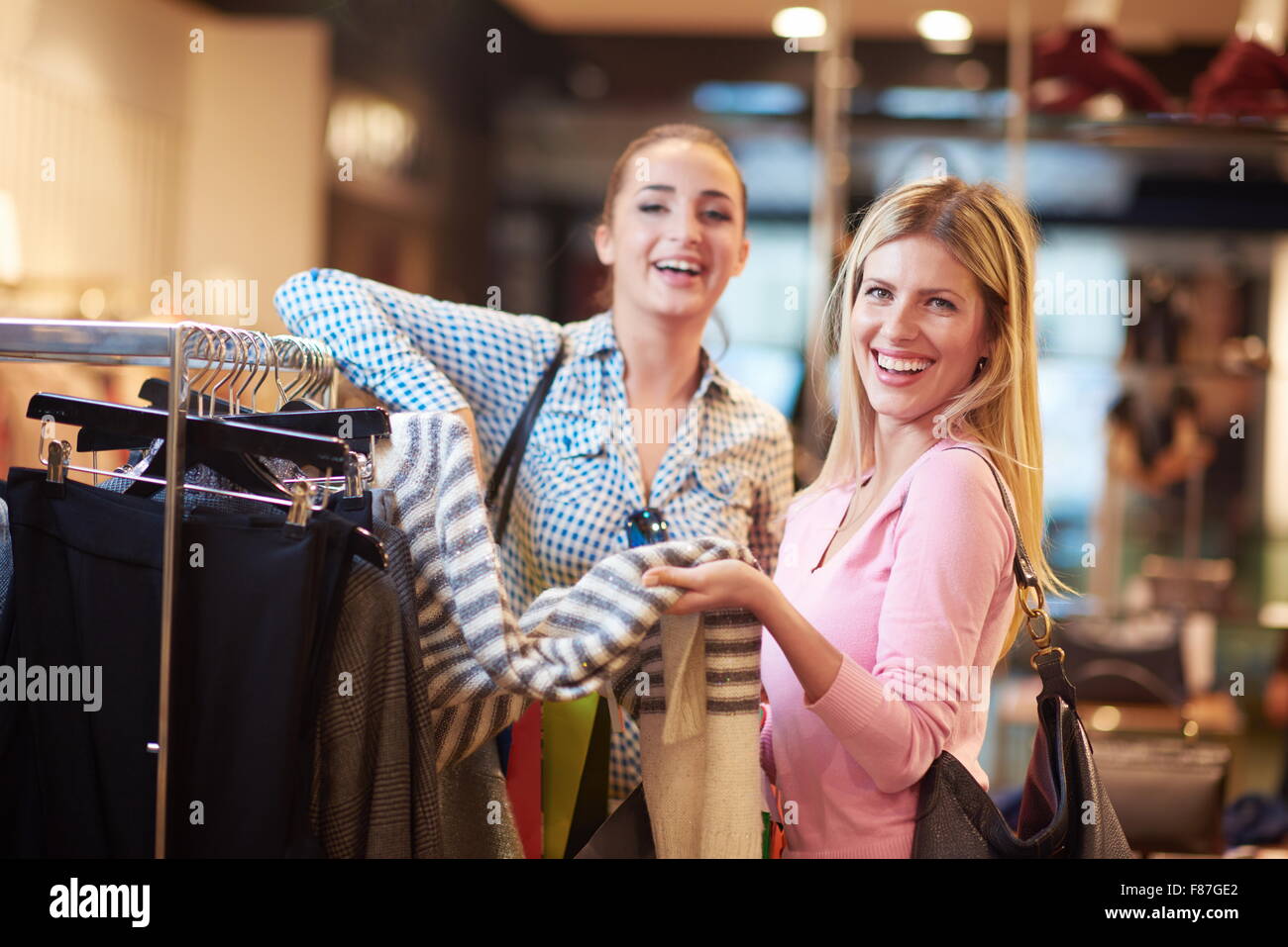 happy young girls in shopping mall, friends having fun together Stock ...