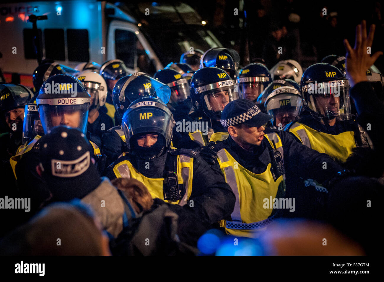 Late into the evening riot police deal with disorder near Trafalgar ...