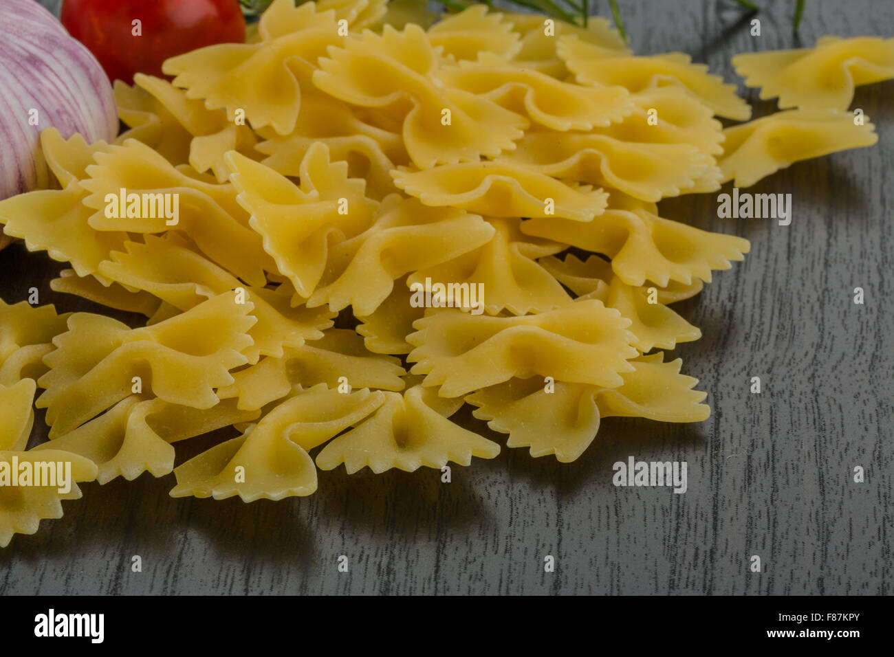 Raw Ties macaroni - italian pasta Stock Photo - Alamy