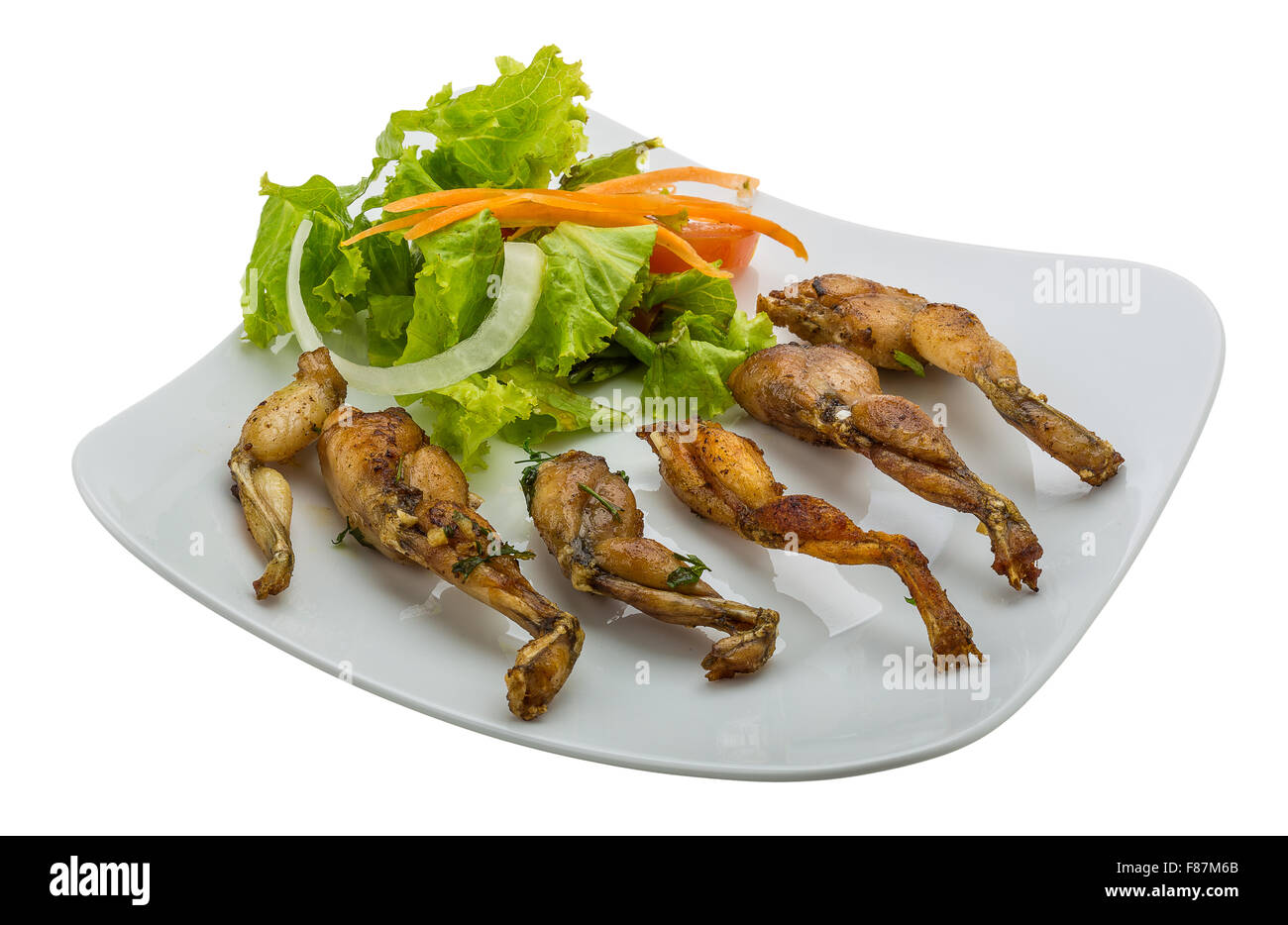 Grilled frog legs - French style Stock Photo - Alamy