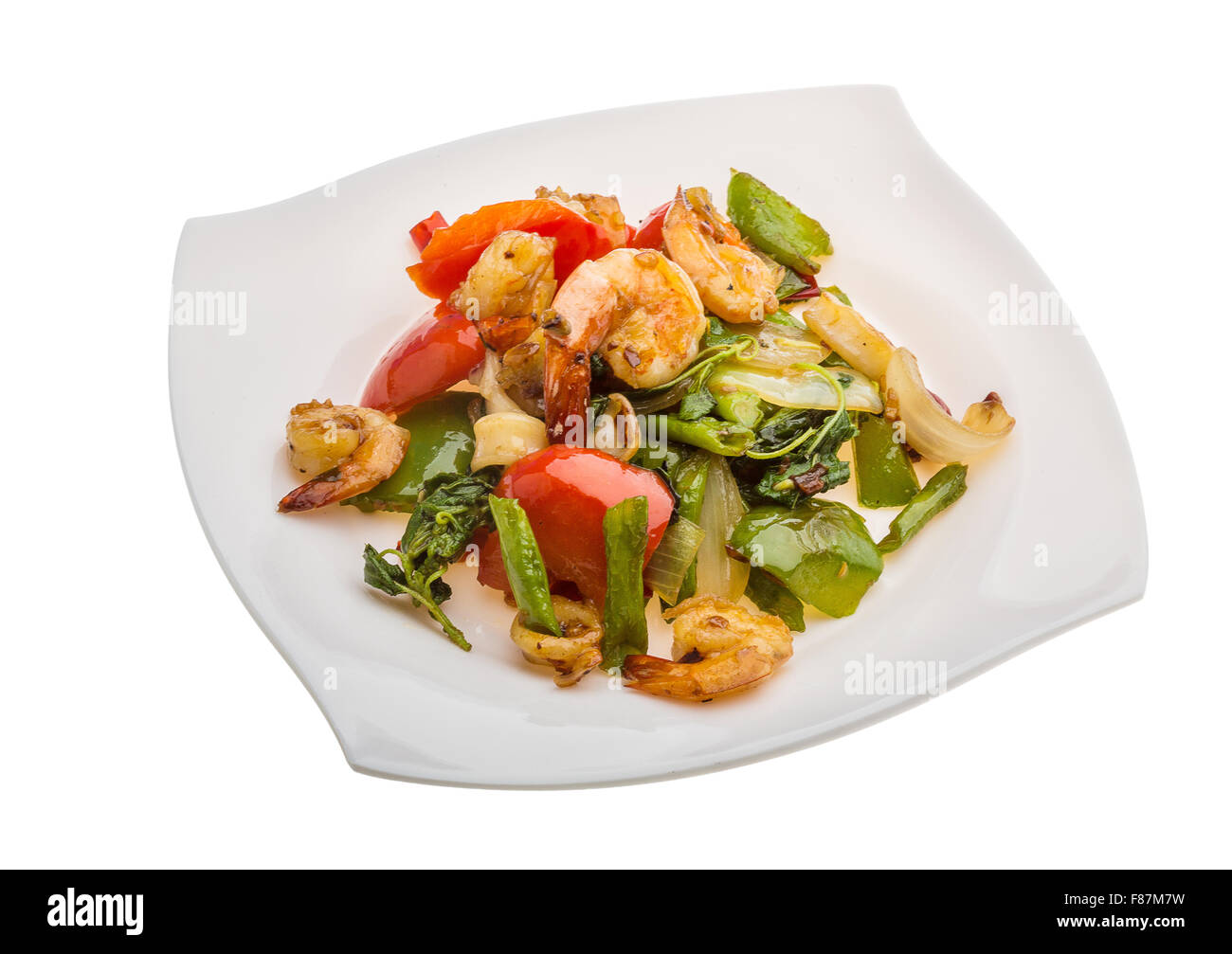 Seafood with vegetables - shrimps and calamari Stock Photo - Alamy