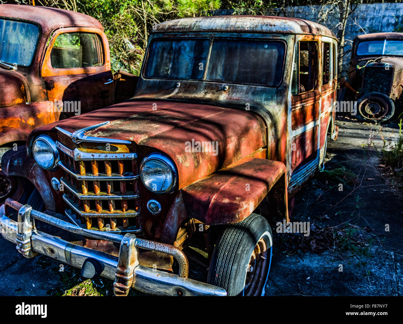 Old, junk cars in the woods Stock Photo - Alamy