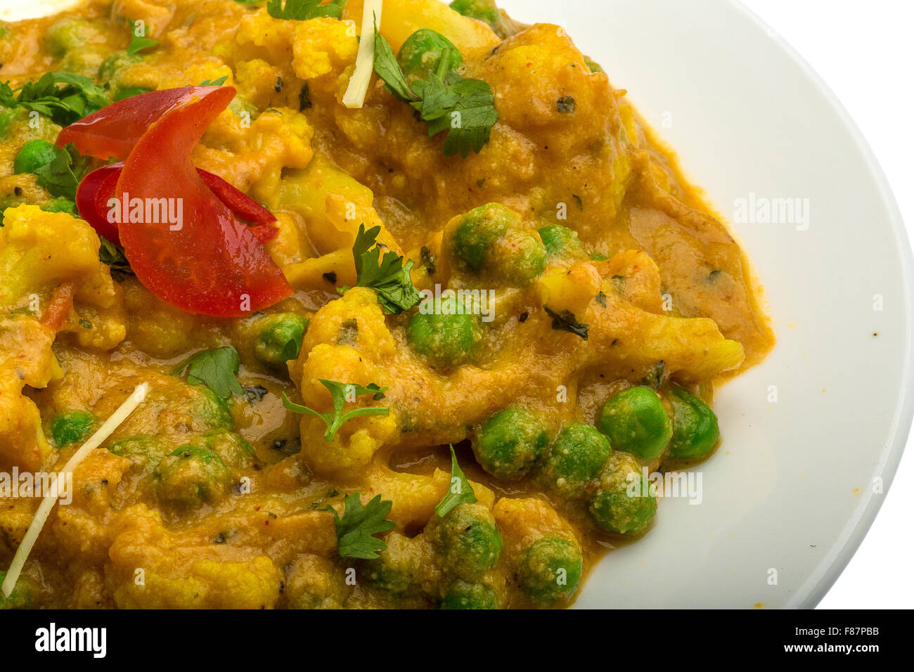 Gobi Mutter Kaju - cauliflower with green peas and cashew Stock Photo ...