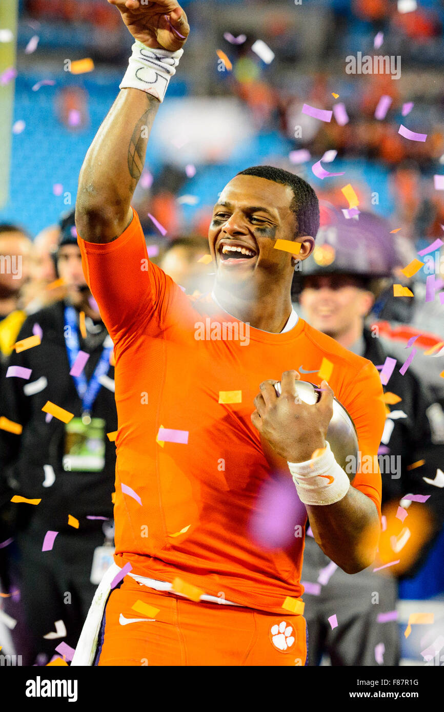 Clemson quarterback Deshaun Watson (4) holds the trophy during the ACC ...