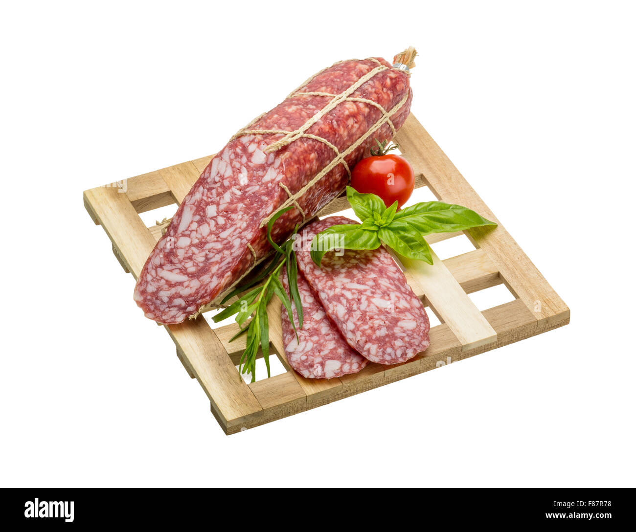Salami sausages sliced with basil Stock Photo - Alamy