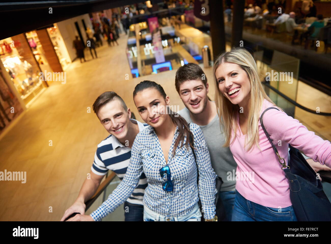 group of happy friends in shopping mall have fun Stock Photo - Alamy