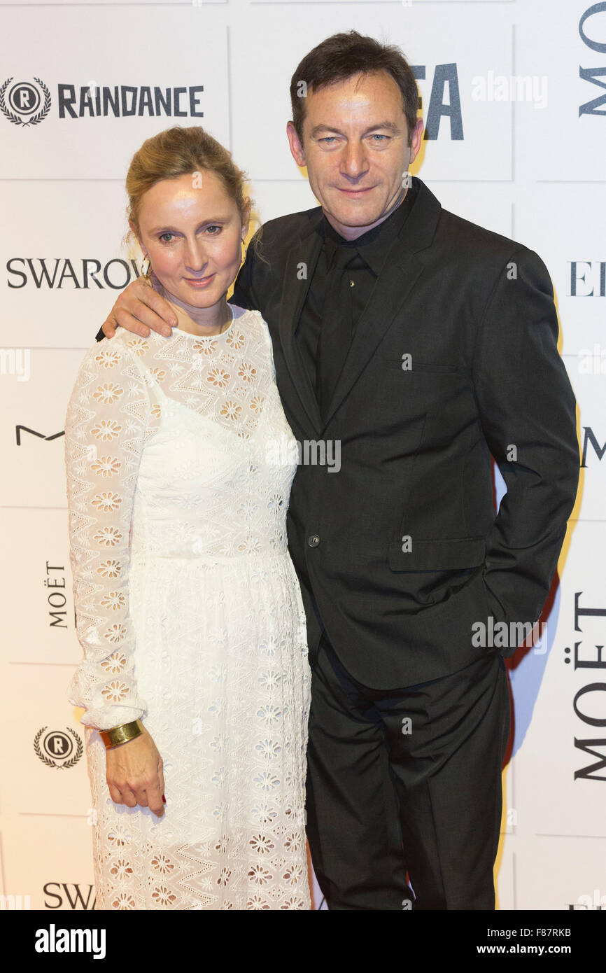 London, UK. 6 December 2015. Emma Hewitt and Jason Isaacs. Red carpet ...