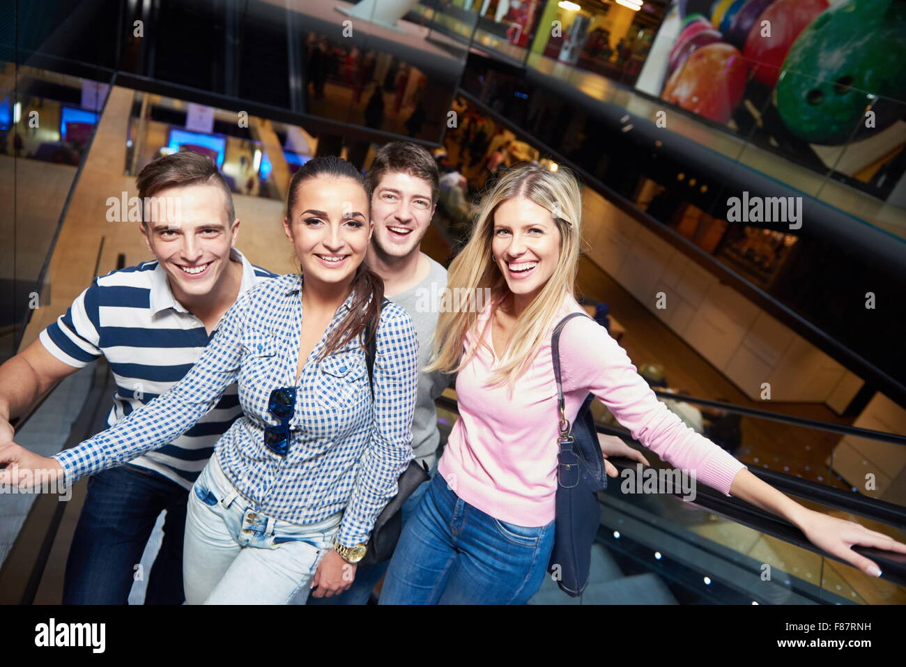 group of happy friends in shopping mall have fun Stock Photo - Alamy