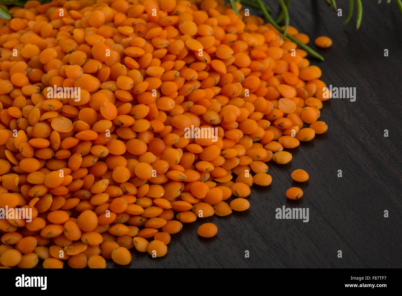 Red raw lentils on the desk Stock Photo - Alamy