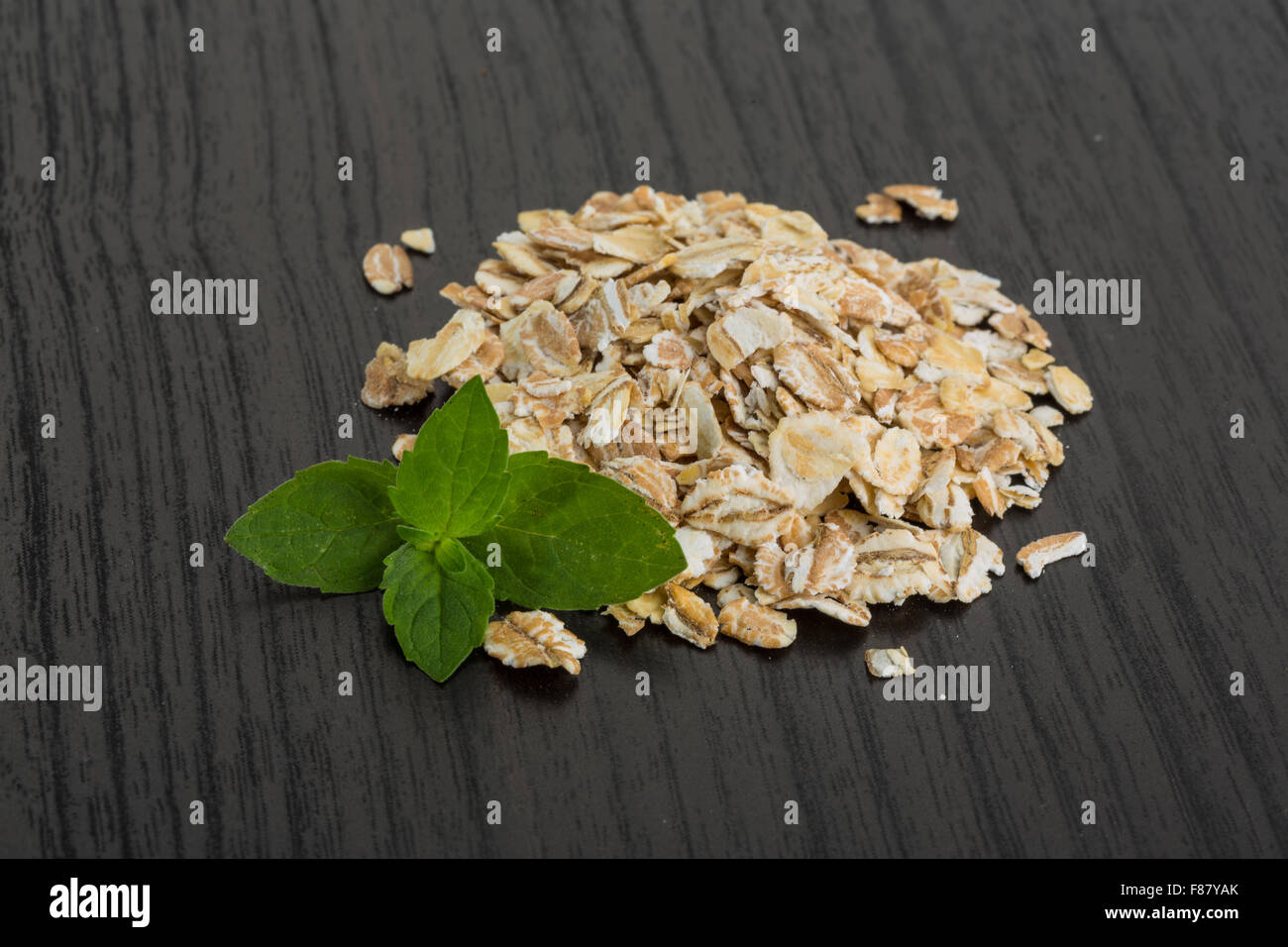 Raw oats on the board Stock Photo - Alamy