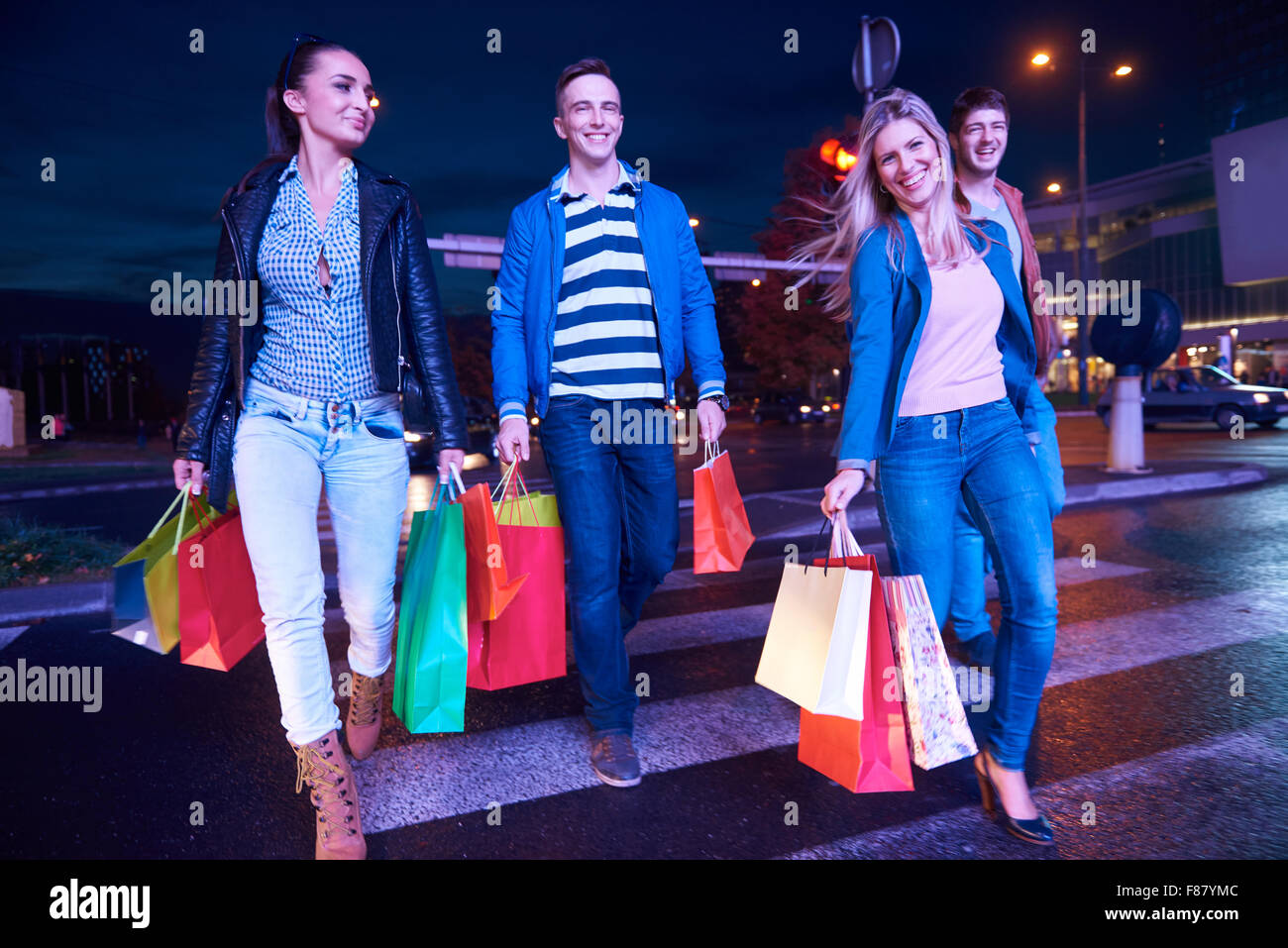 Group Of Friends Enjoying Shopping Trip Together group of happy young ...