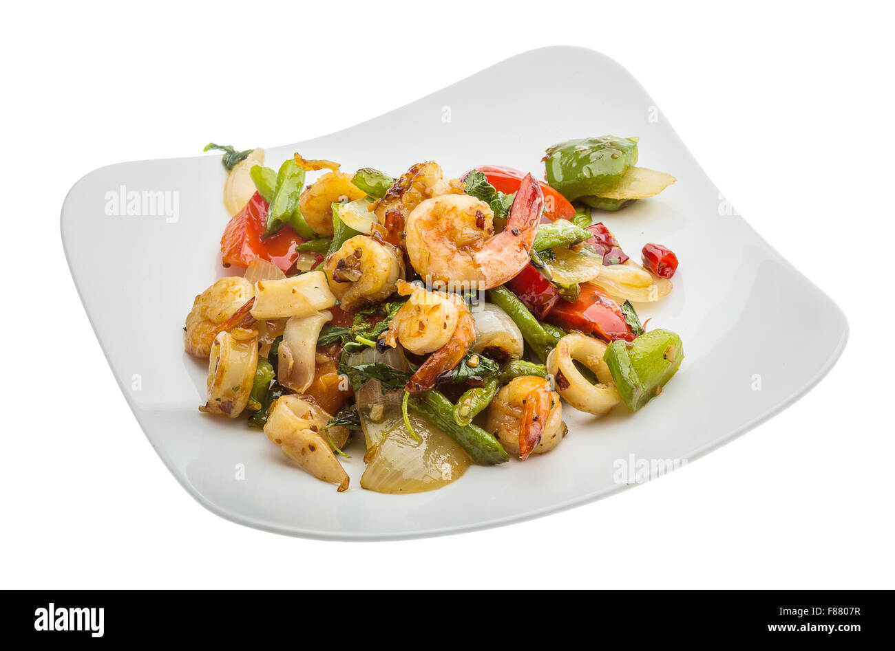 Seafood with vegetables - shrimps and calamari Stock Photo - Alamy