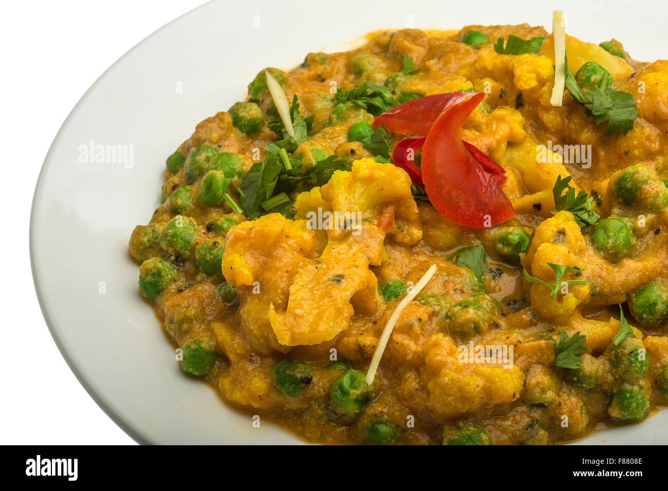 Gobi Mutter Kaju - cauliflower with green peas and cashew Stock Photo ...