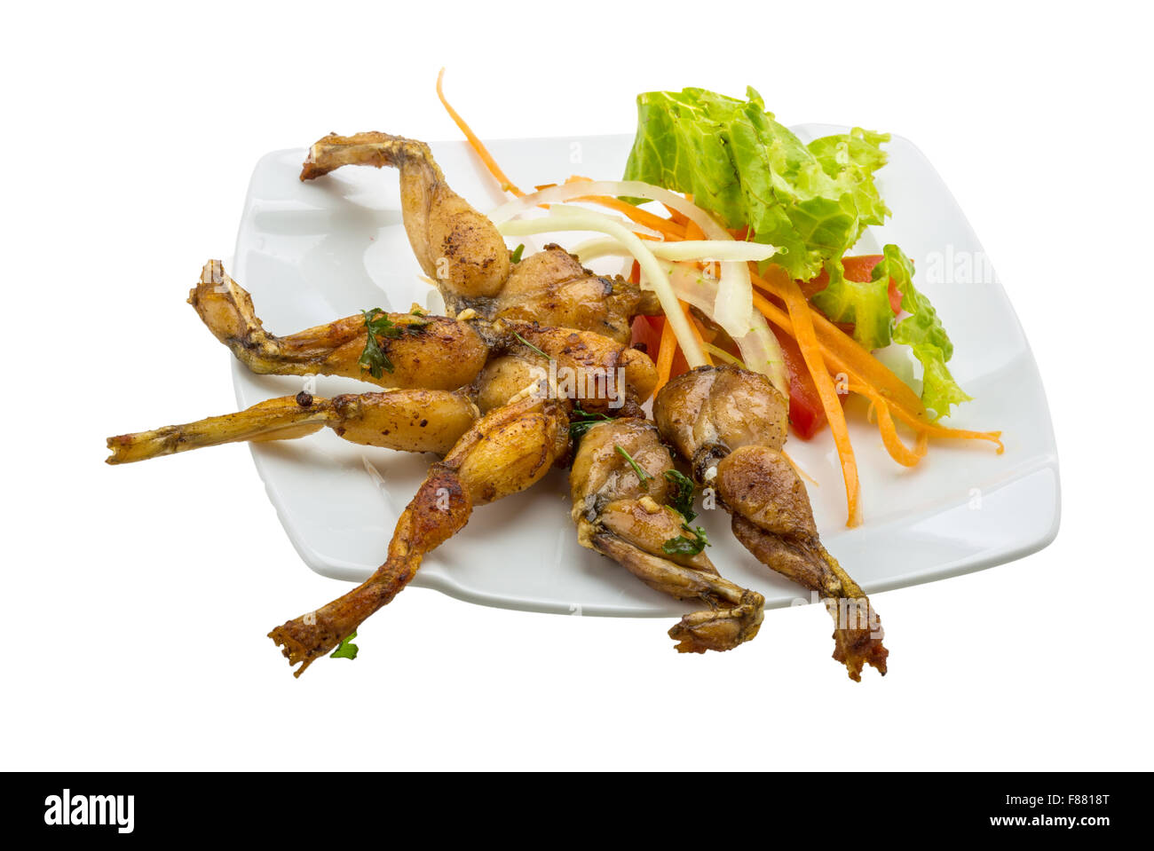 Grilled frog legs - French style Stock Photo - Alamy